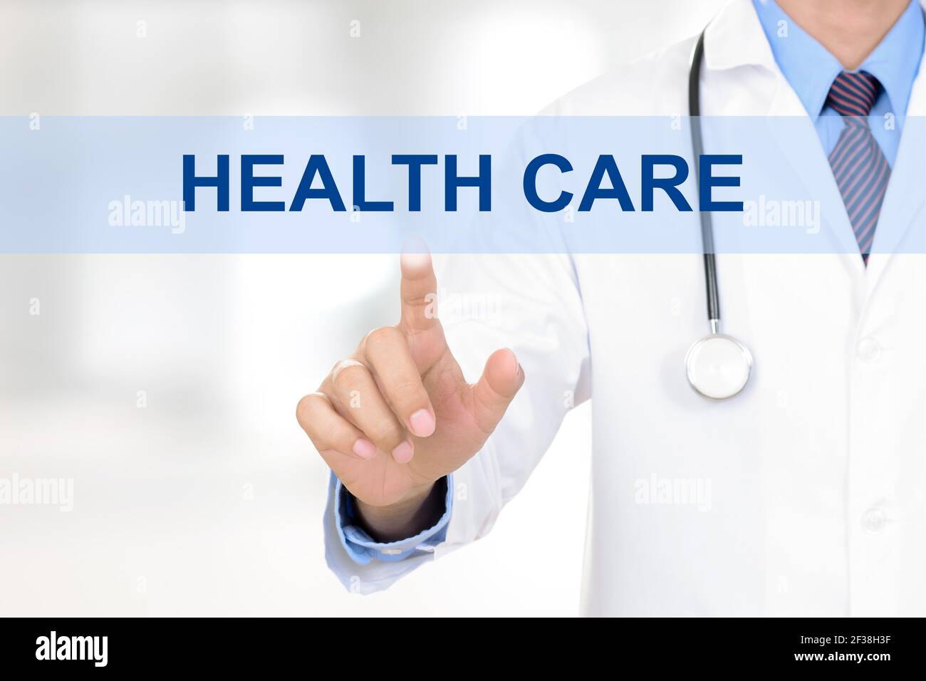 Doctor hand touching HEALTH CARE sign virtual screen Stock Photo - Alamy
