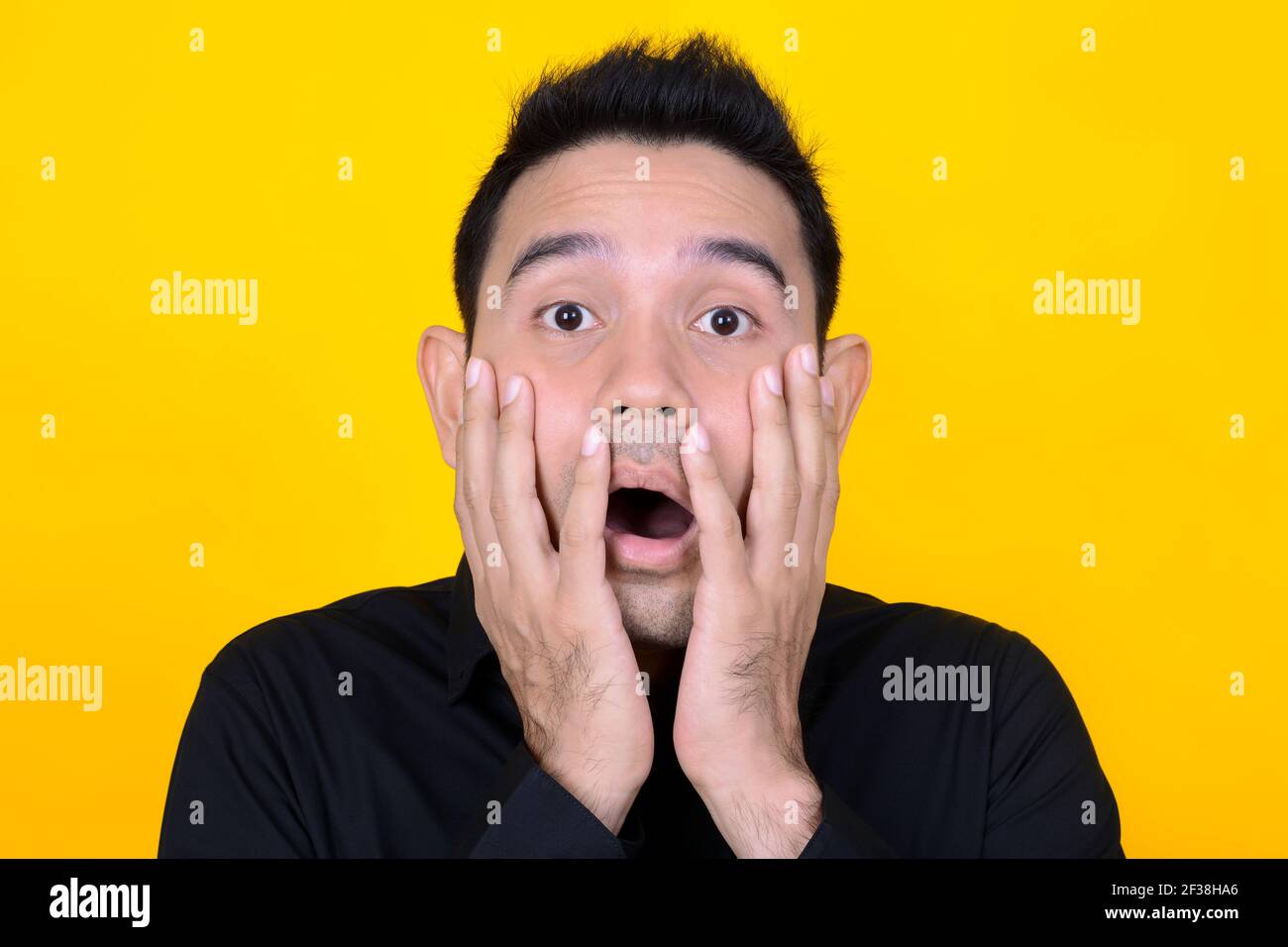 Surprise shocked face asian hi-res stock photography and images - Alamy