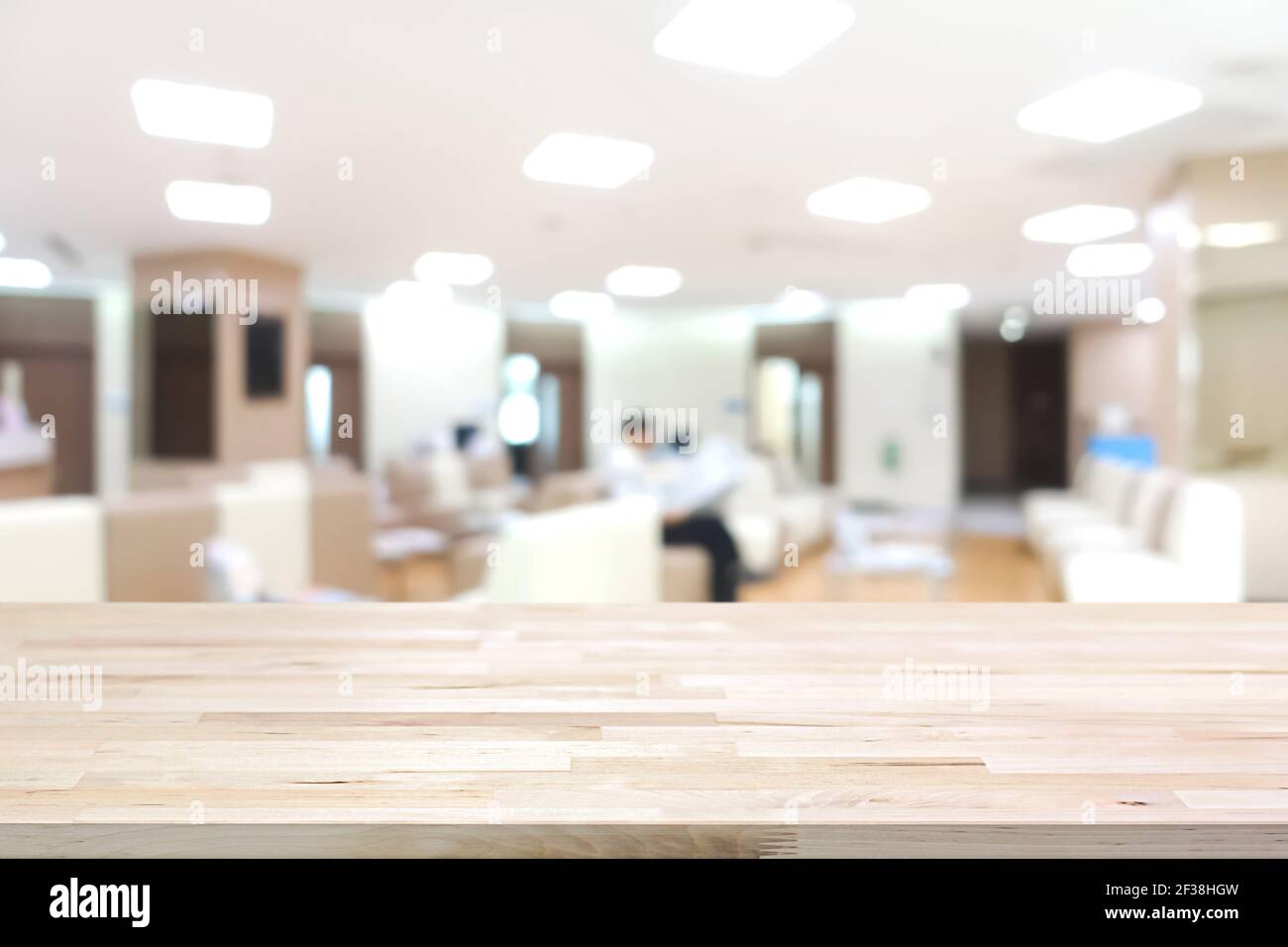 Wood table top on blur white room background - can be used as office or ...