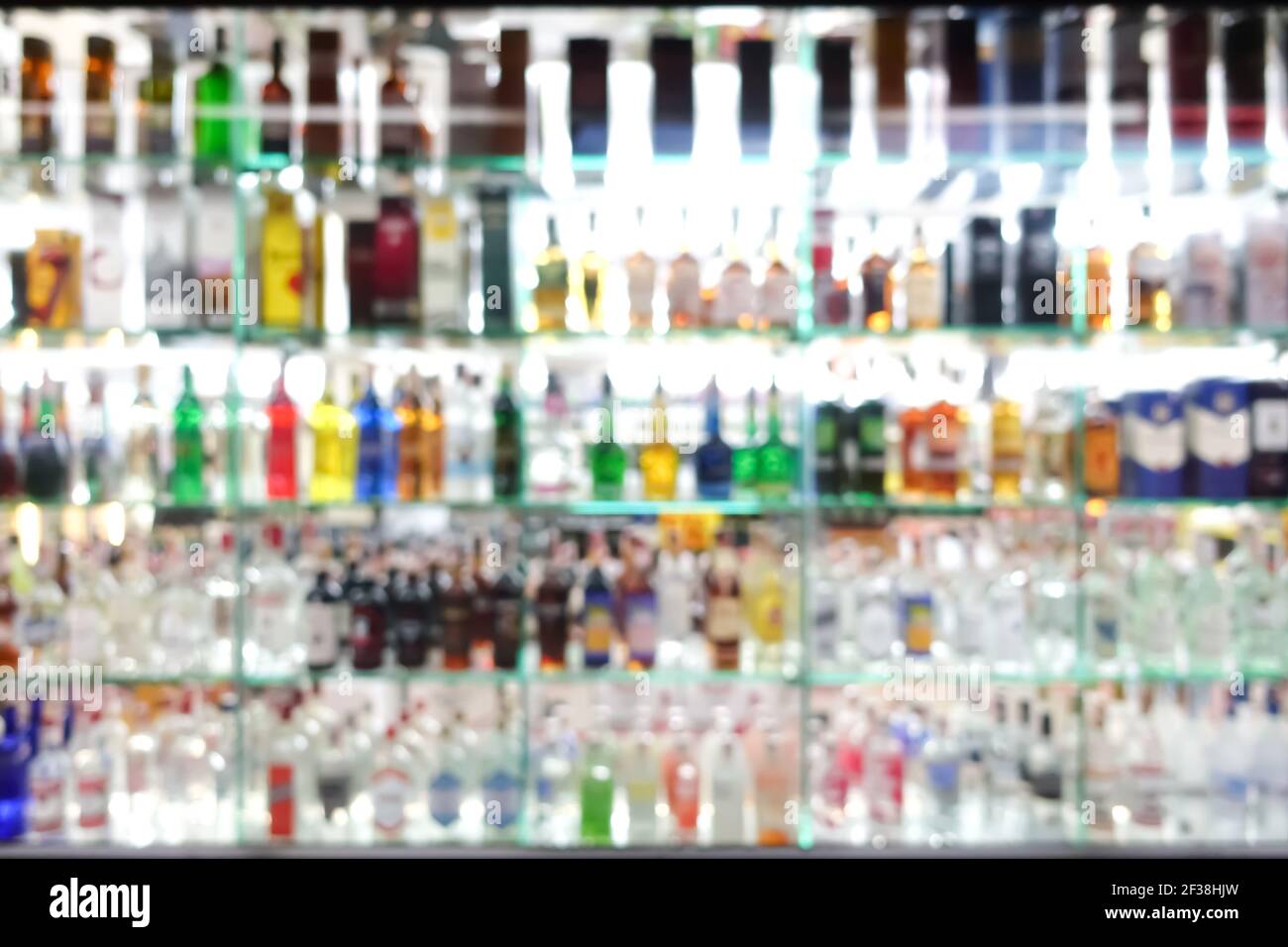 Blur colorful alcohol drink bottles for background Stock Photo - Alamy