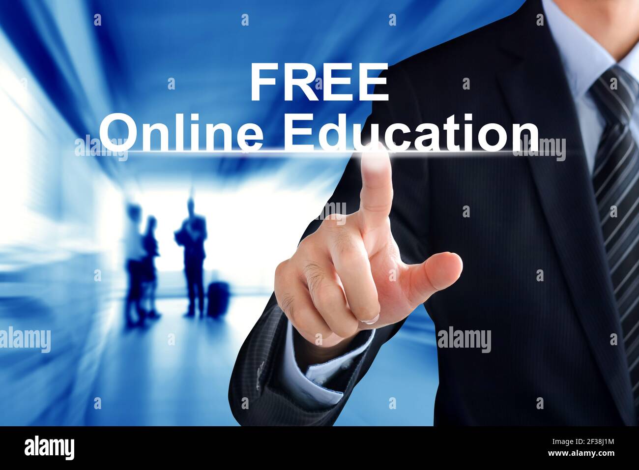 Businessman hand touching FREE Online Education sign virtual screen ...