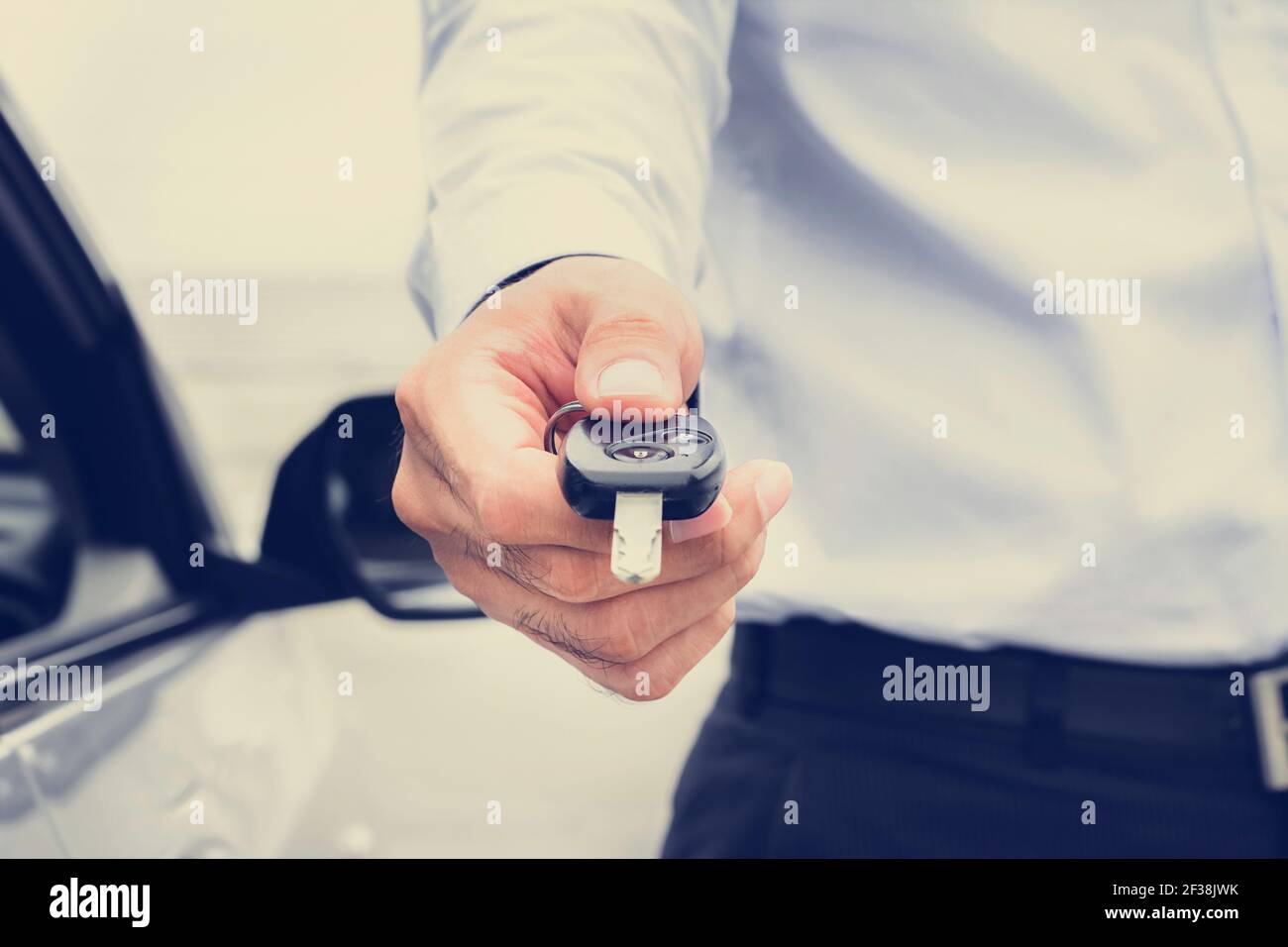 Giving a key car hi-res stock photography and images - Alamy