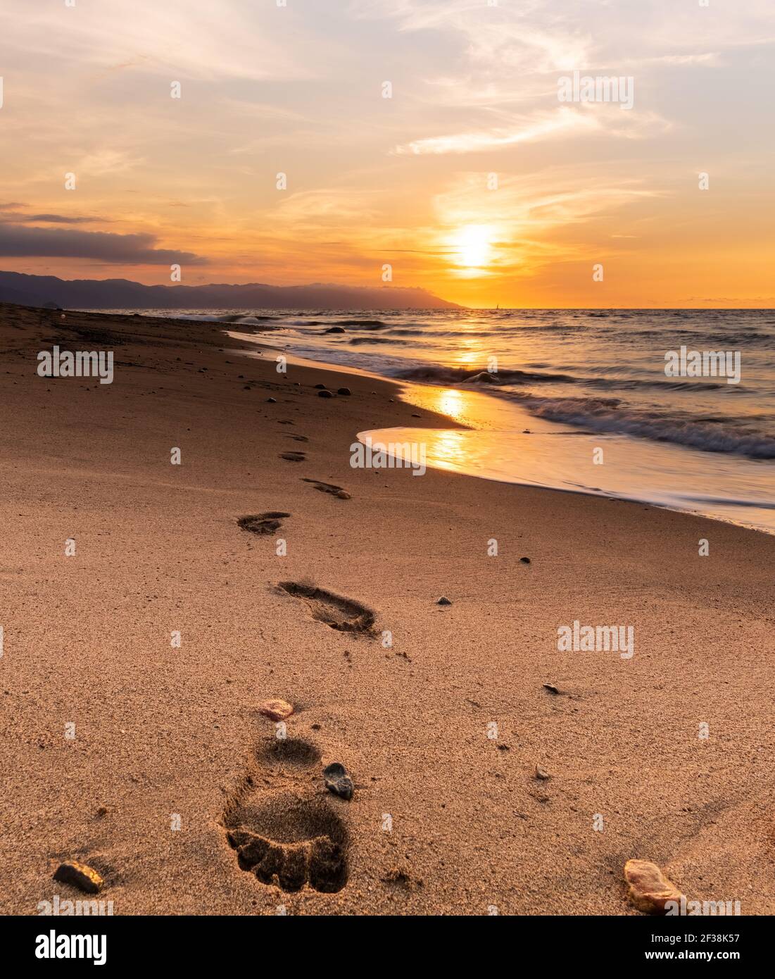 Footsteps In The Sand Sunset