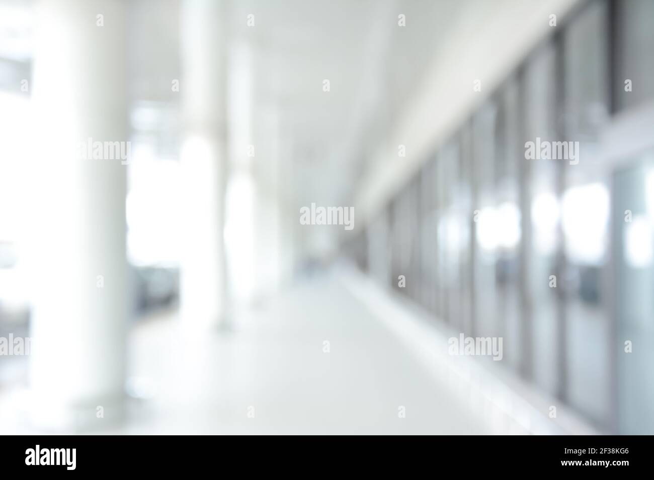 Blur image of white building hallway (or corridor), for background ...
