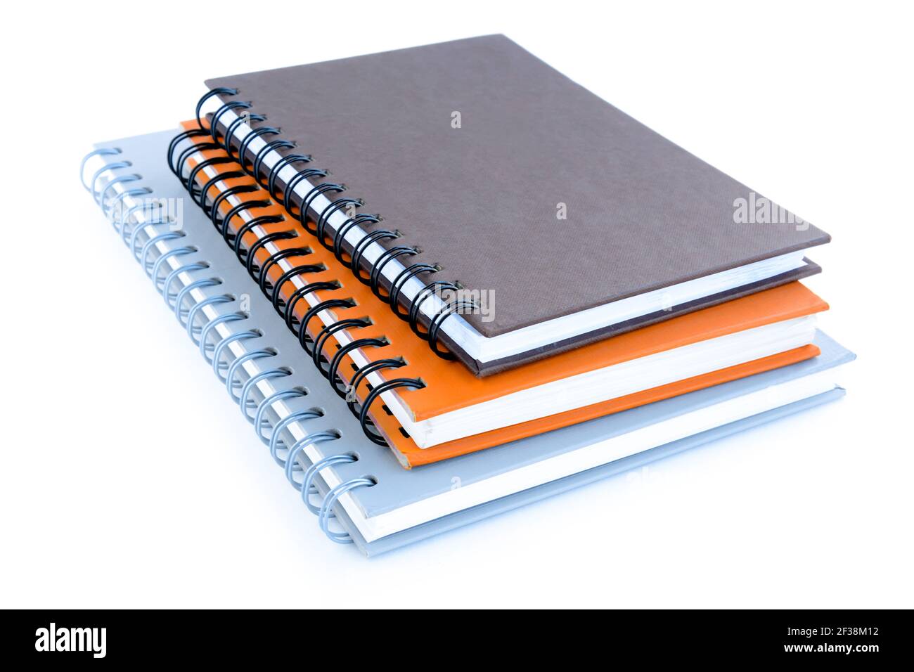 Stack of notebooks (or copybooks) on white background Stock Photo - Alamy