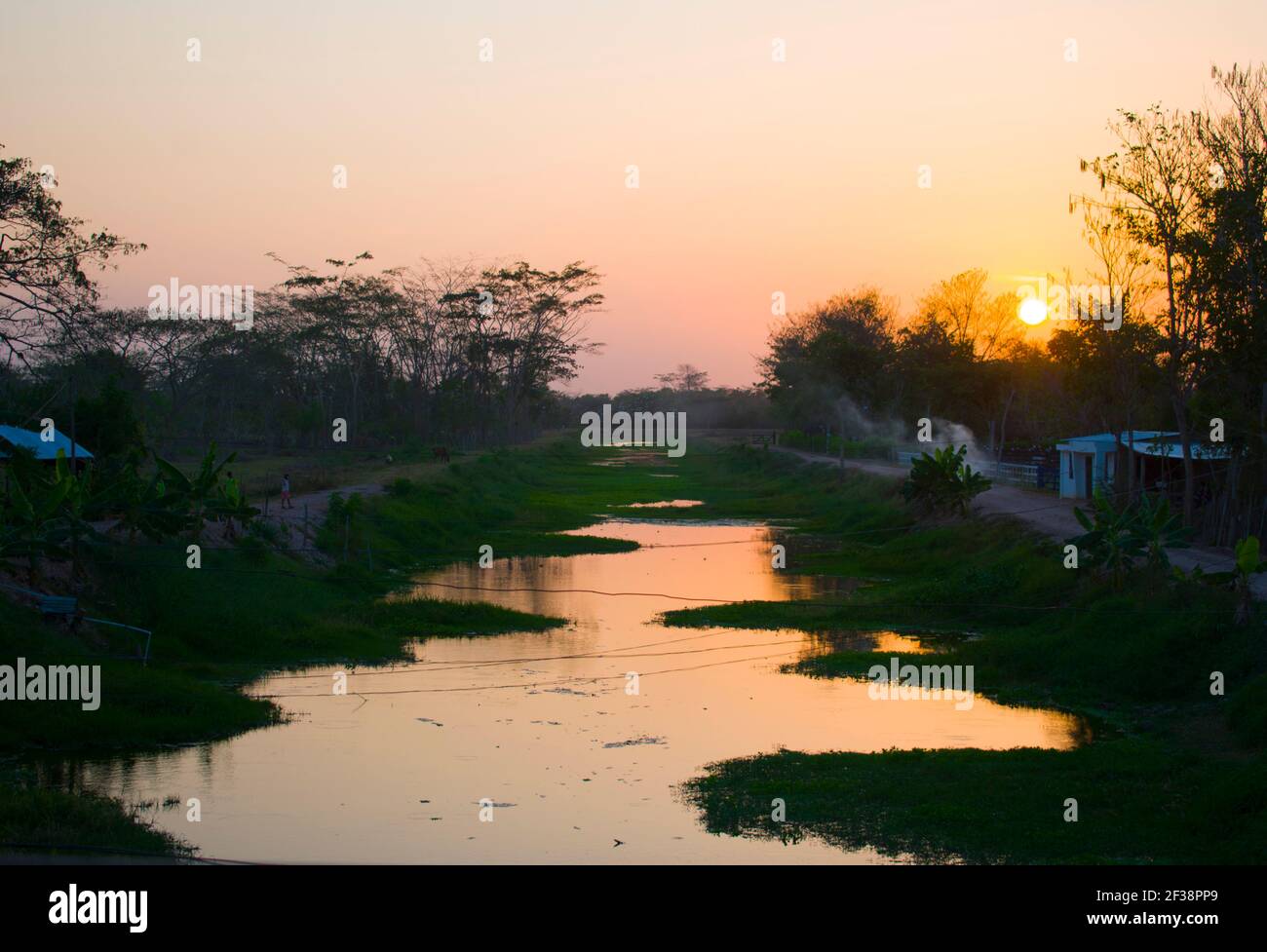 beautiful sunset of a coastal town in Colombia Stock Photo - Alamy