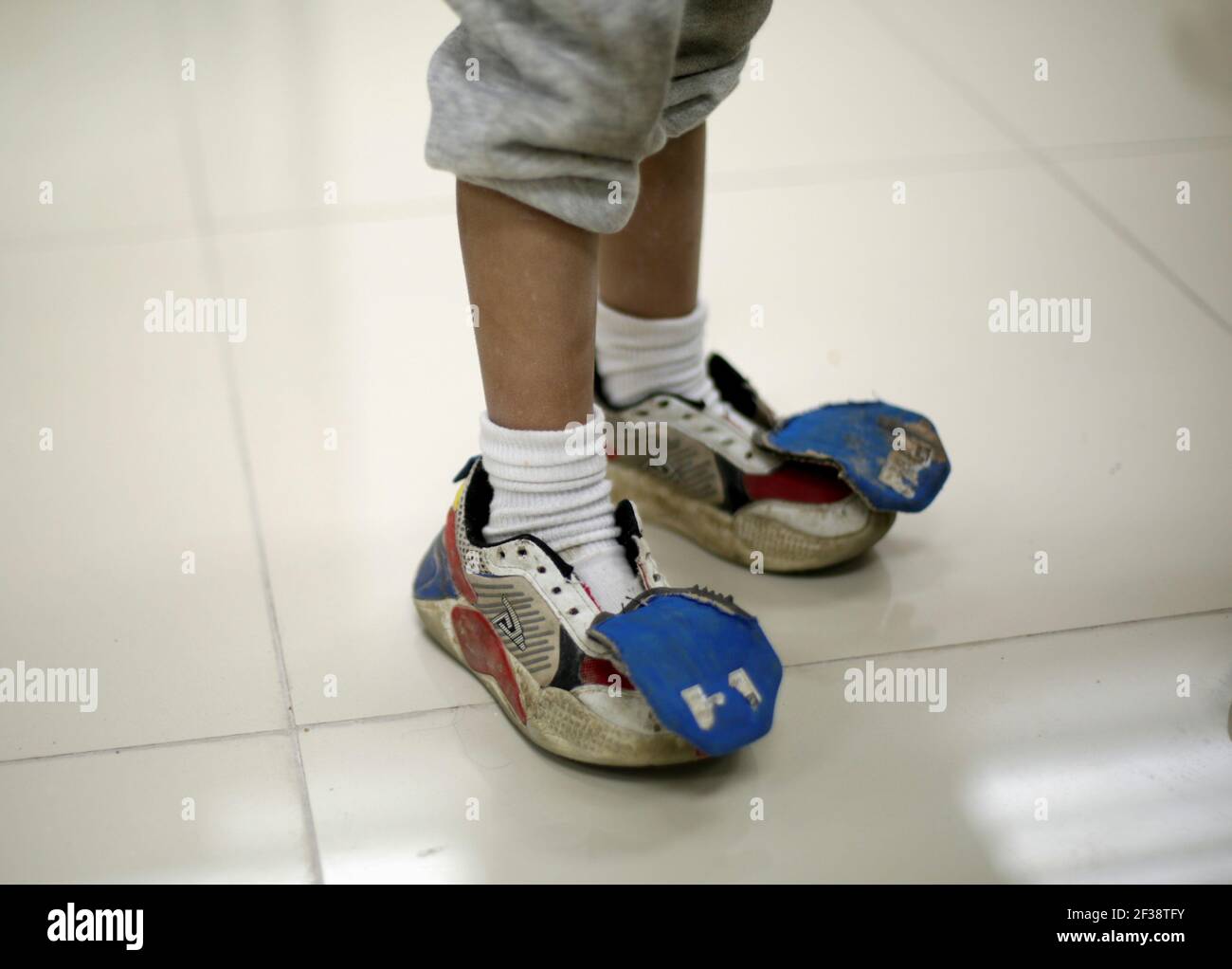 Child without shoes hi-res stock photography and images - Alamy