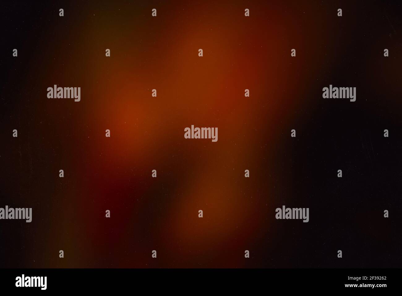 colorful warm rainbow light leaks on black background with dust texture Stock Photo - Alamy