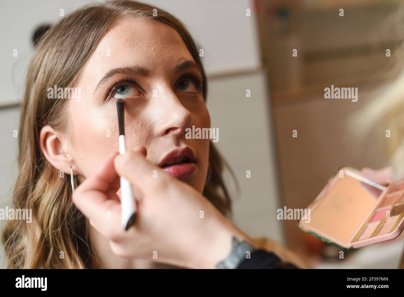 Berlin, Germany. 11th Mar, 2021. Singer Ambre Vallet is made up during ...
