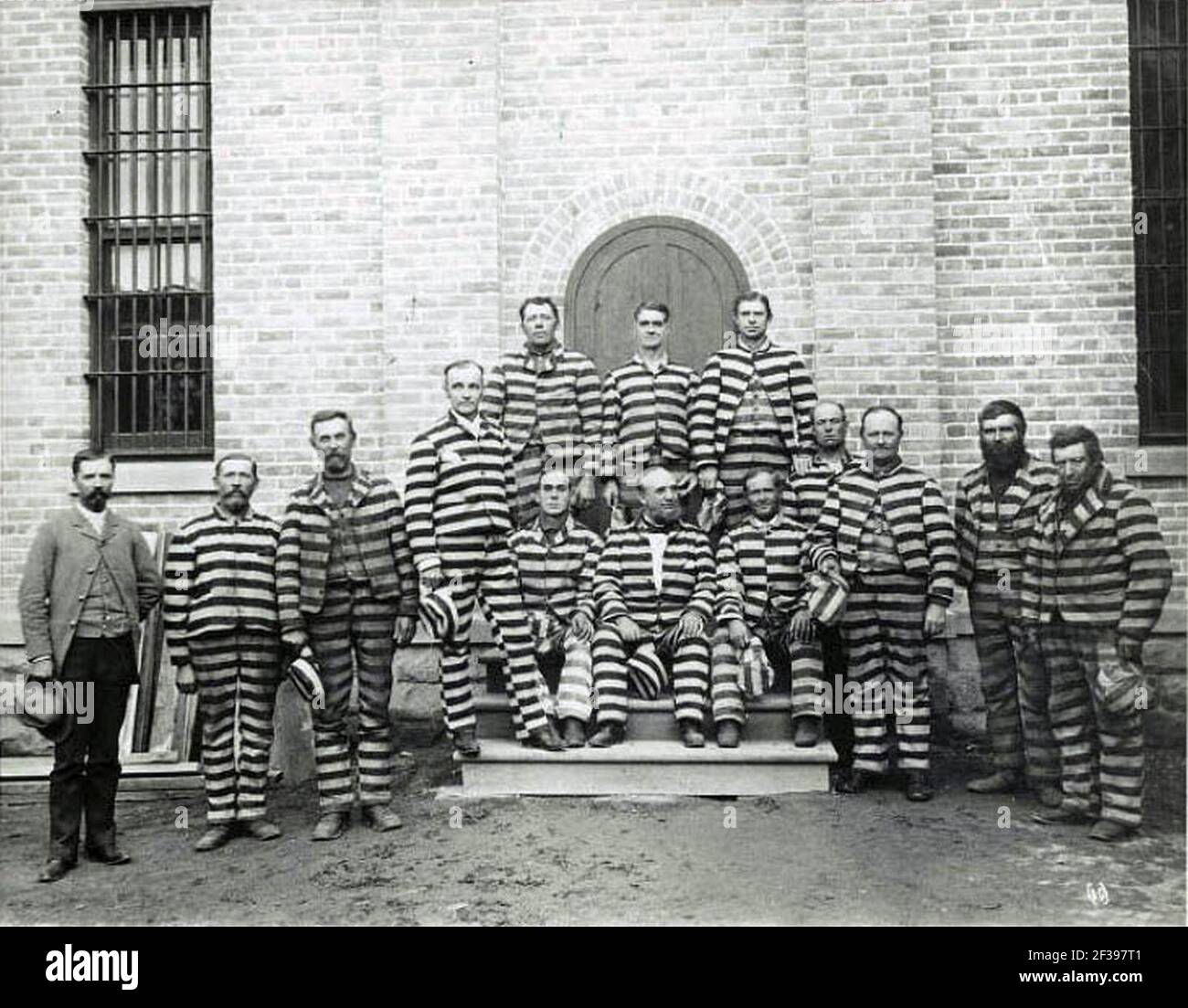 Prisoners photographed in jail front Stock Photo - Alamy