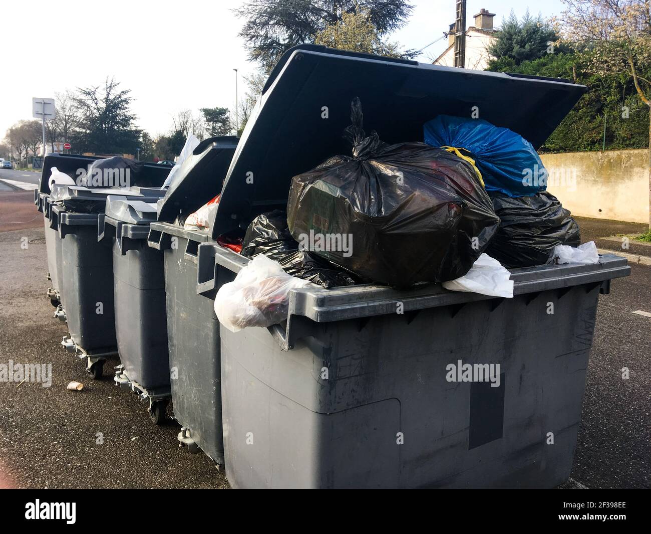 Garbage cans in the street, Bron, France Stock Photo - Alamy