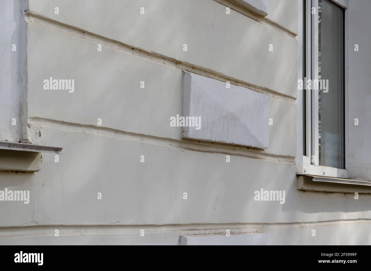 Exterior light yellow wall of the old building. Geometric composition ...