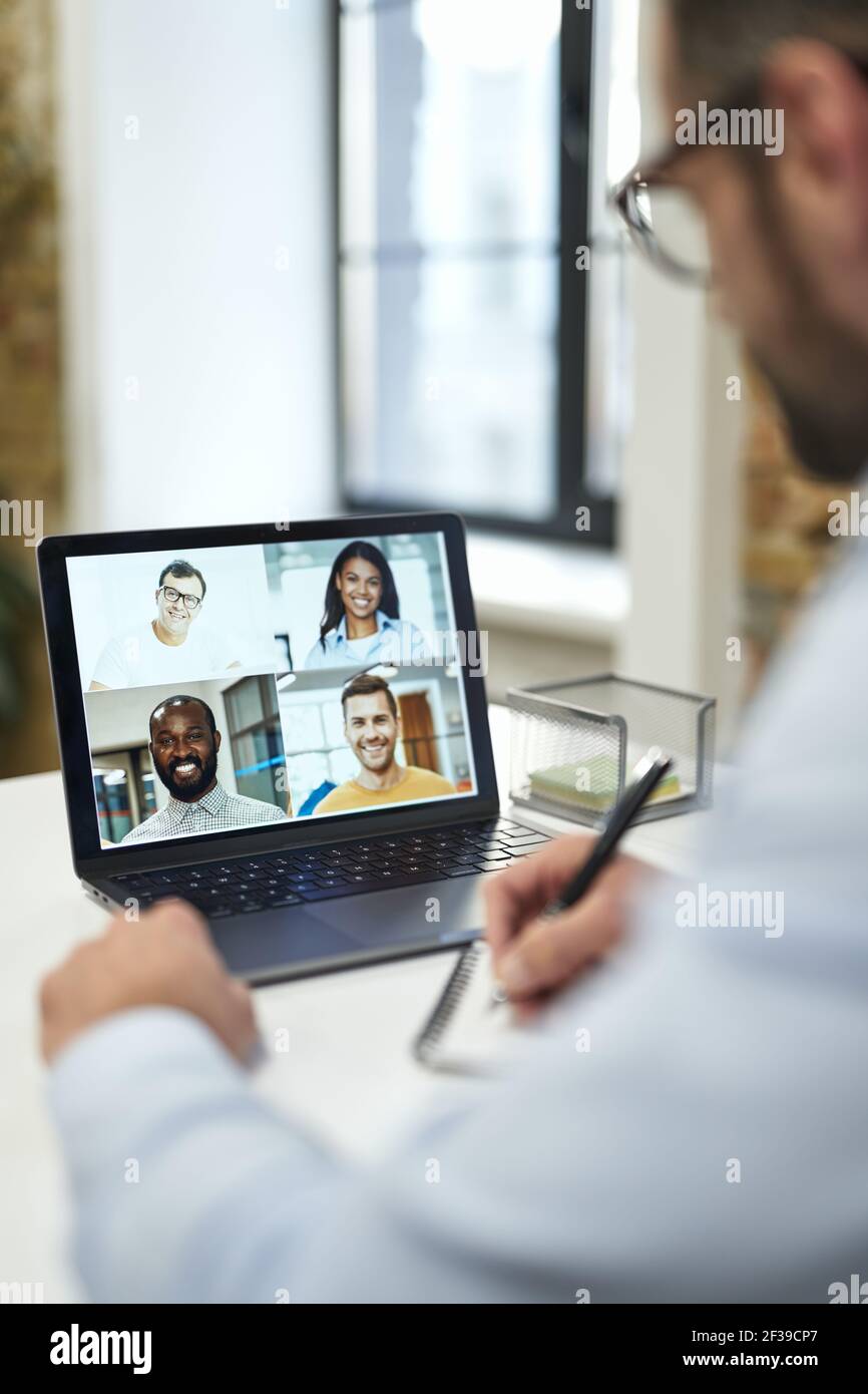 Writing Down The Best Ideas During The Online Meeting Stock Photo Alamy writing-down-the-best-ideas-during-the-online-meeting-stock-photo-alamy