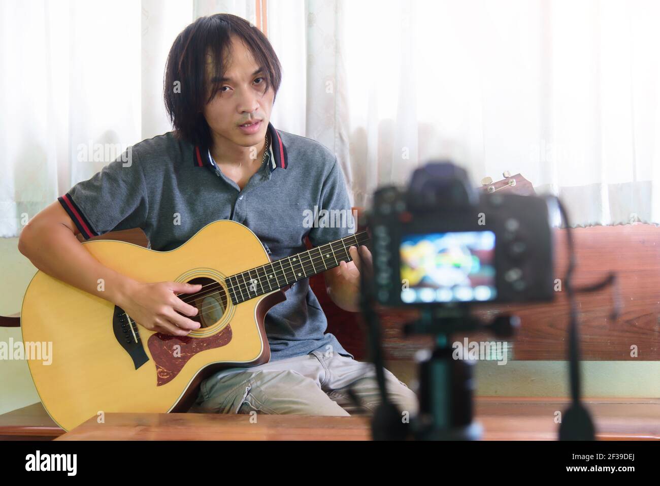 Camera recording guitar asian hi-res stock photography and images - Alamy