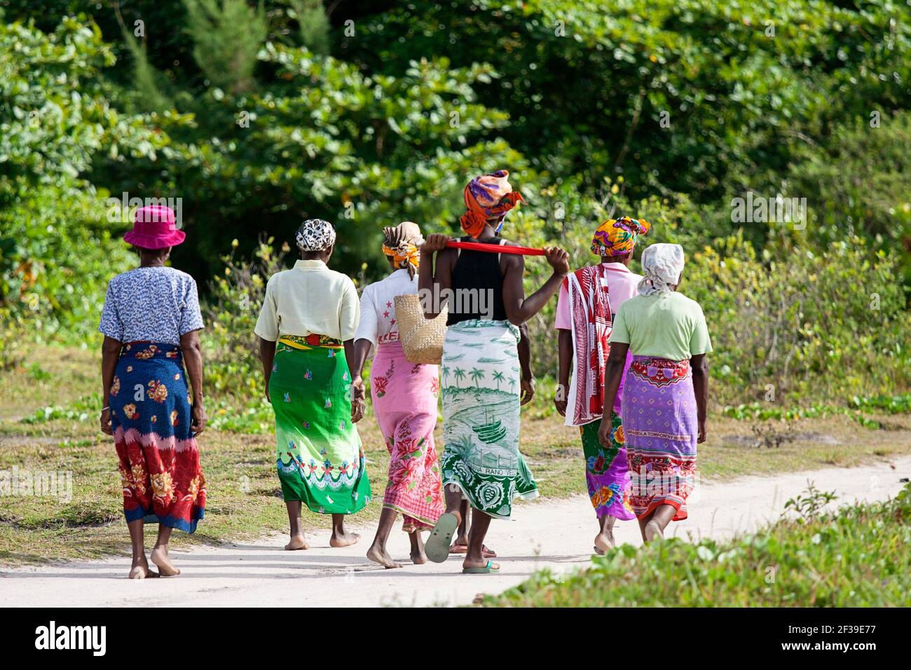 Local malagsy women in traditional wrapped colorful cloth as skirts ...