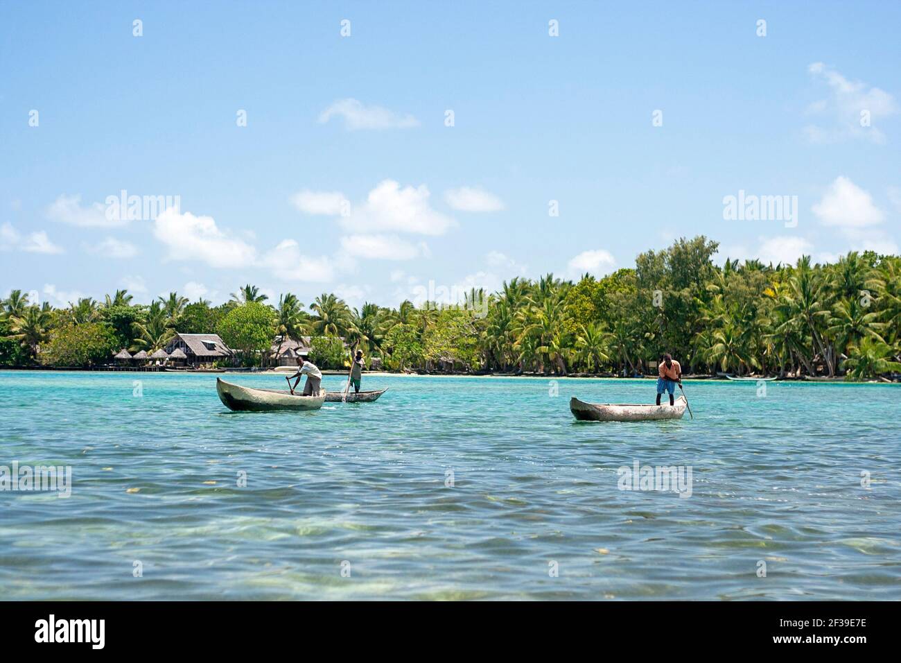 typical pirogues at tropical paradise island Ile aux Nattes with white ...