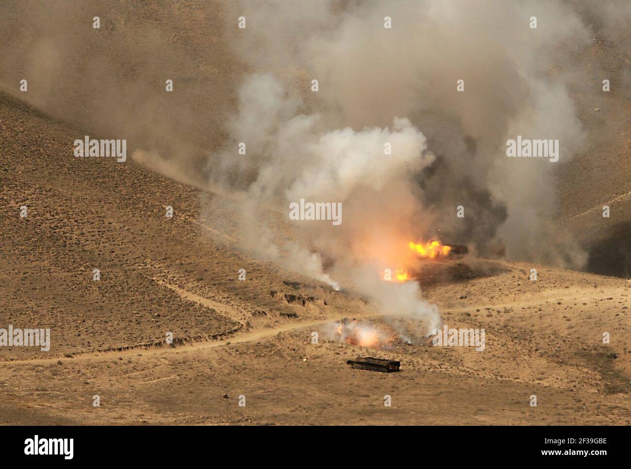 Projectiles fired by Afghan soldiers impact a target at the Infantry ...
