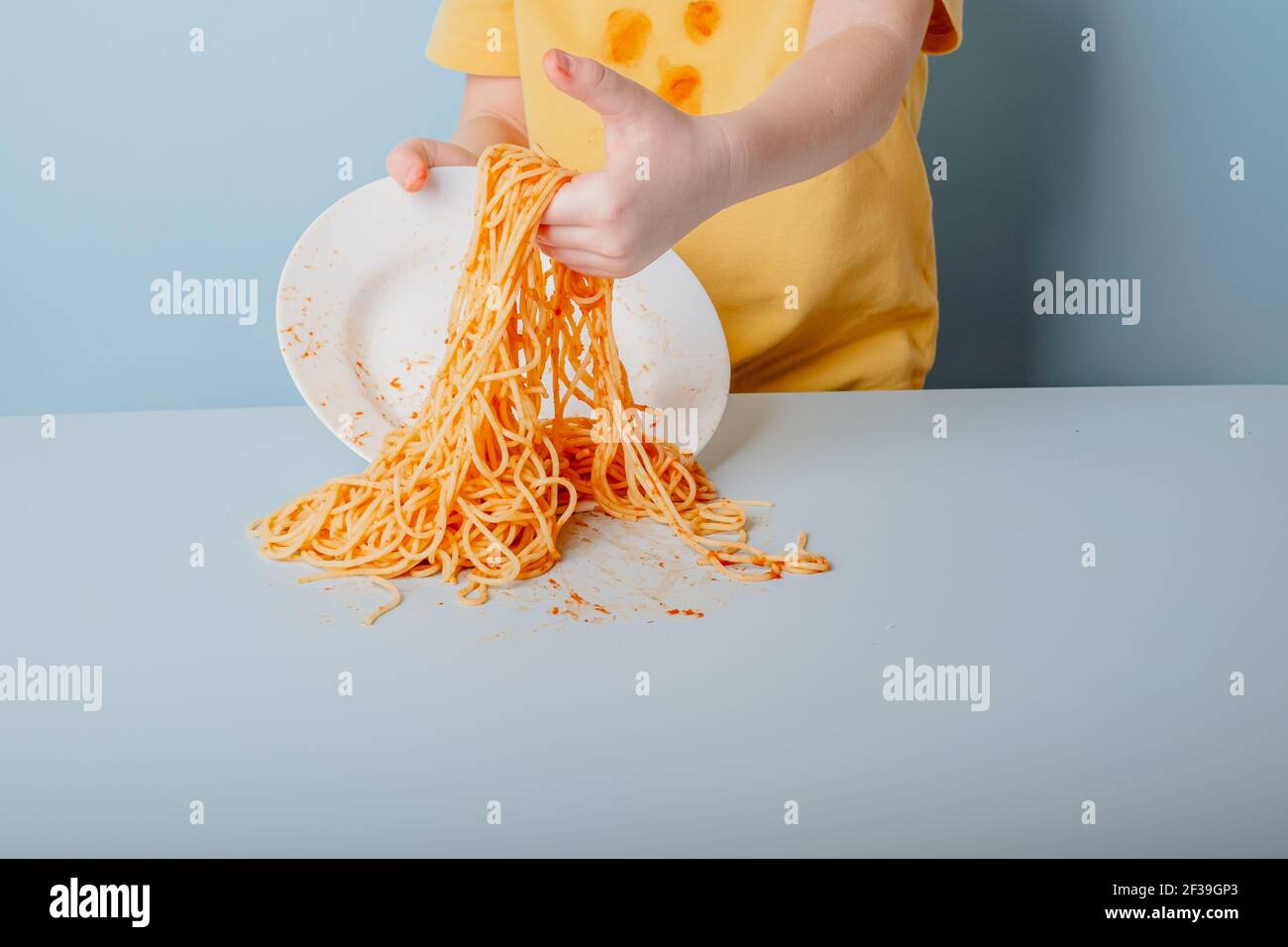 Dropped food on shirt hi-res stock photography and images - Alamy