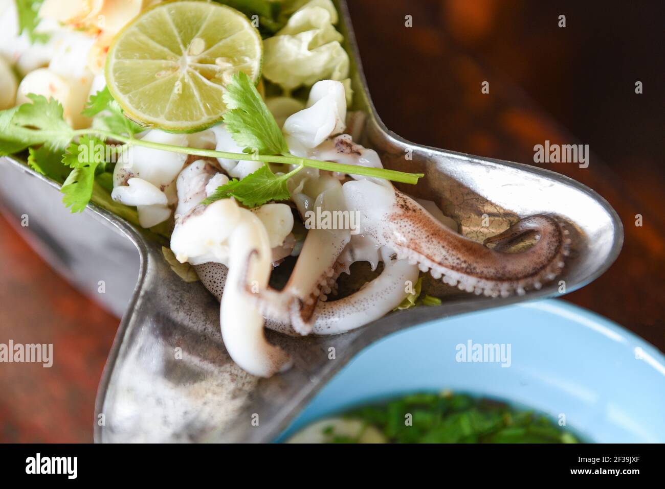 Steamed Squid with Lemon, hot and spicy squid steamed with lime - Thai ...