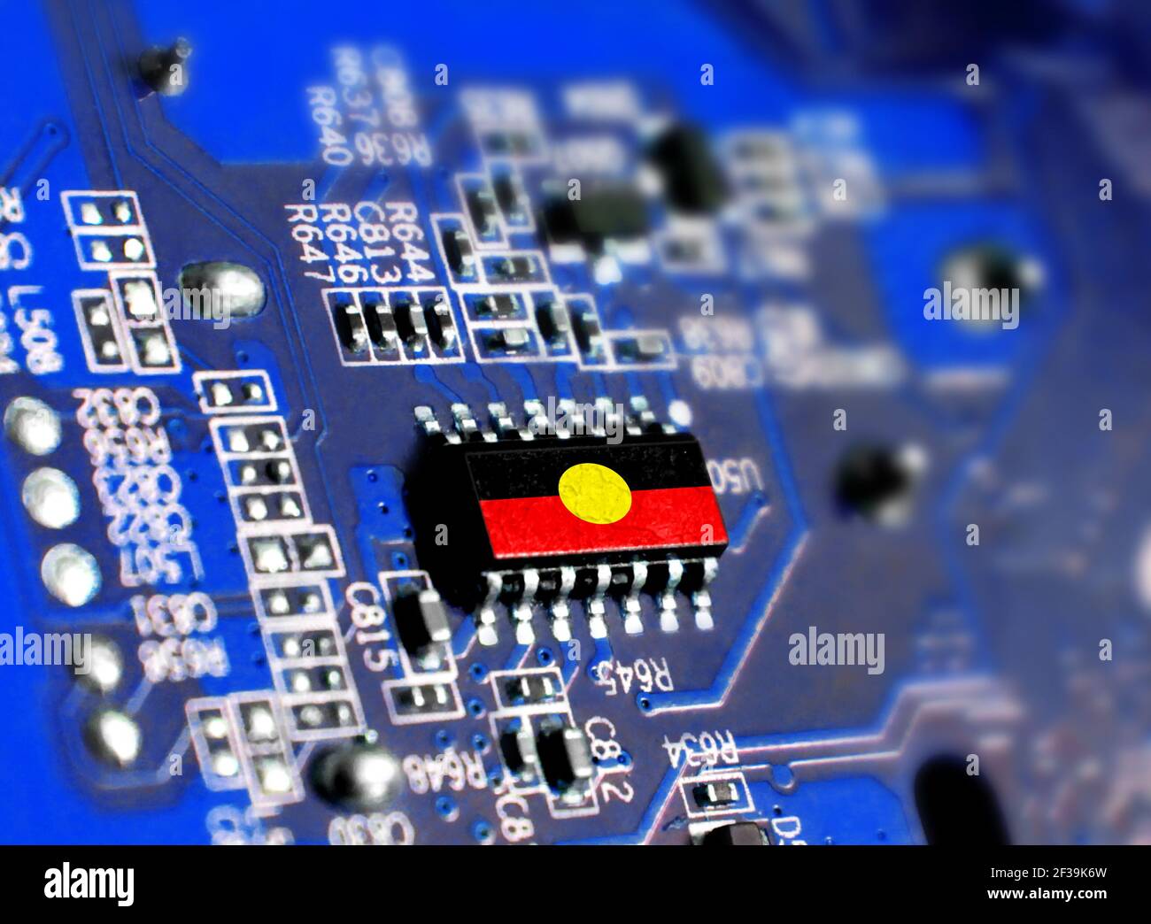 Electronic board with embedded microchip and shown flag of Australian ...