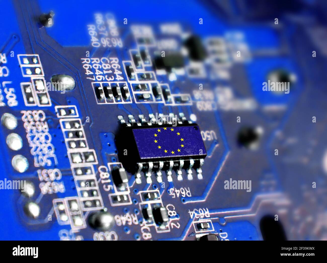 Electronic board with embedded microchip and shown flag of European ...
