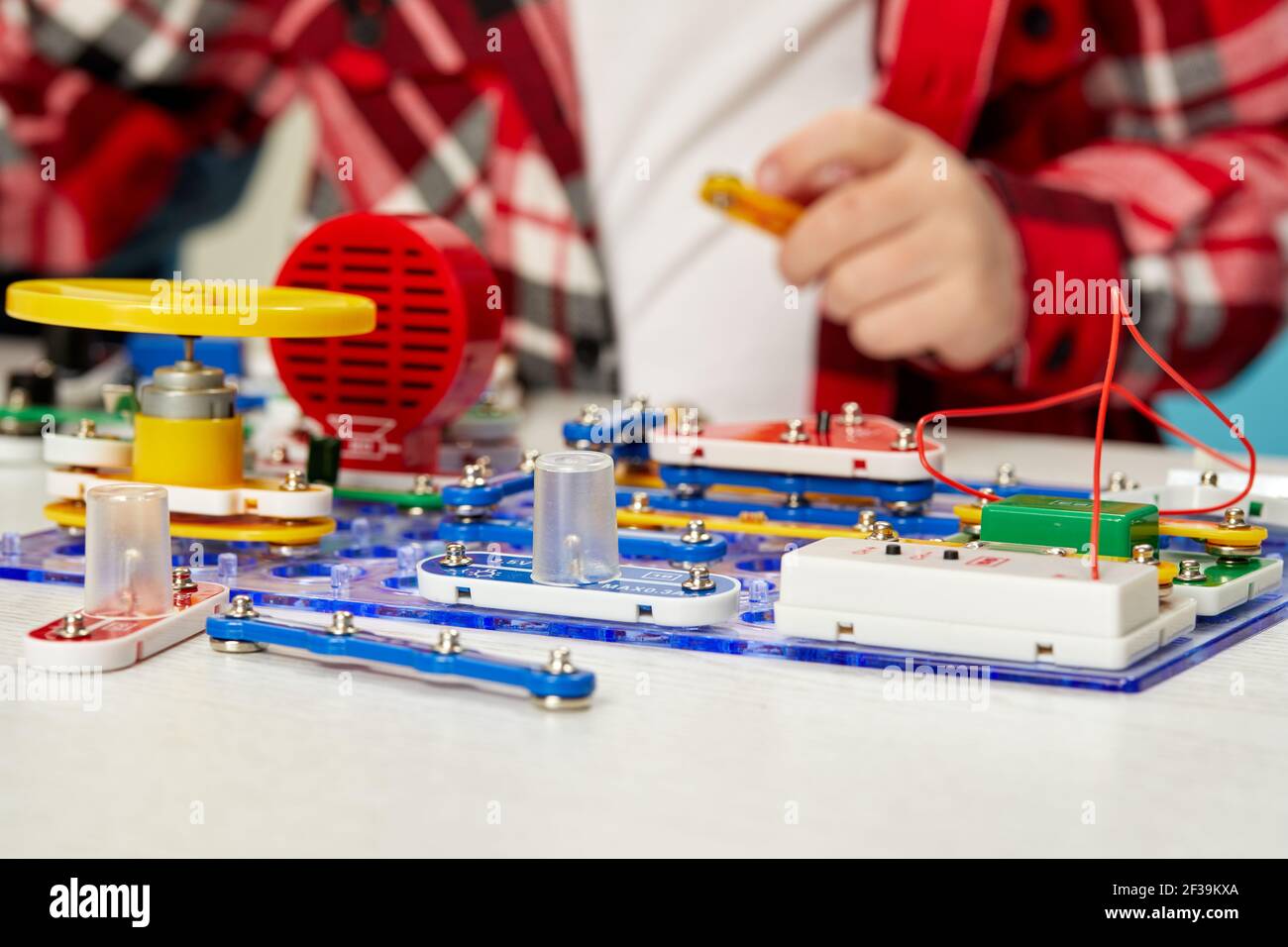 children playing with electronic constructor at studio Stock Photo - Alamy