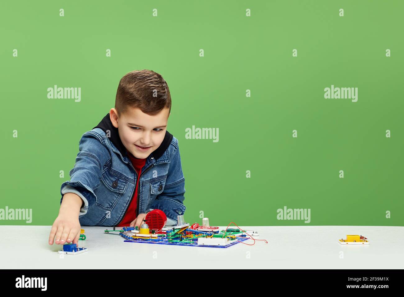 children playing with electronic constructor at studio Stock Photo - Alamy