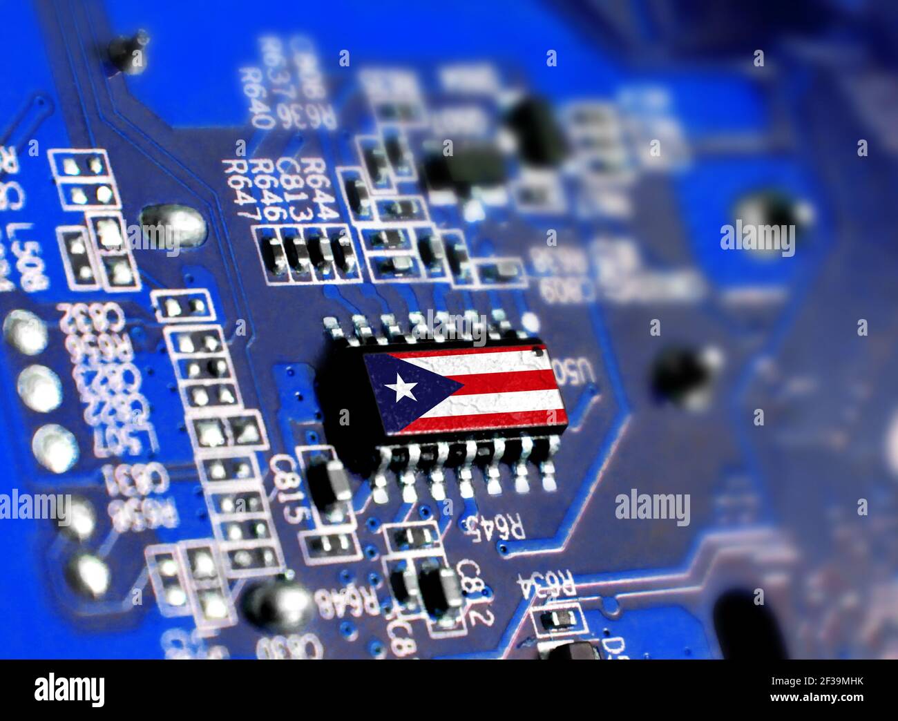 Electronic board with embedded microchip and shown flag of Puerto Rico ...