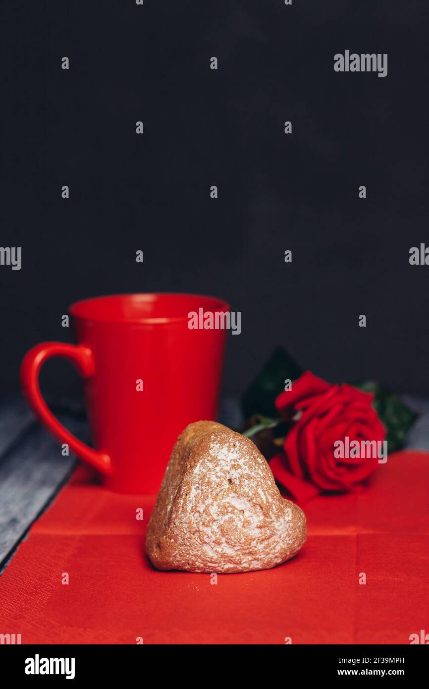 sweet biscuits on a red napkin rose flower snack Stock Photo - Alamy