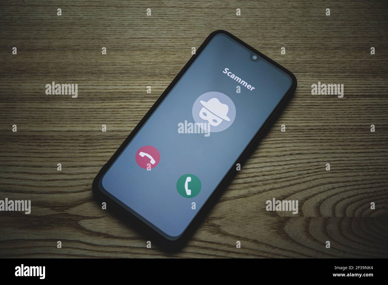 Incoming call from Scammer. Online scam on phone Stock Photo - Alamy