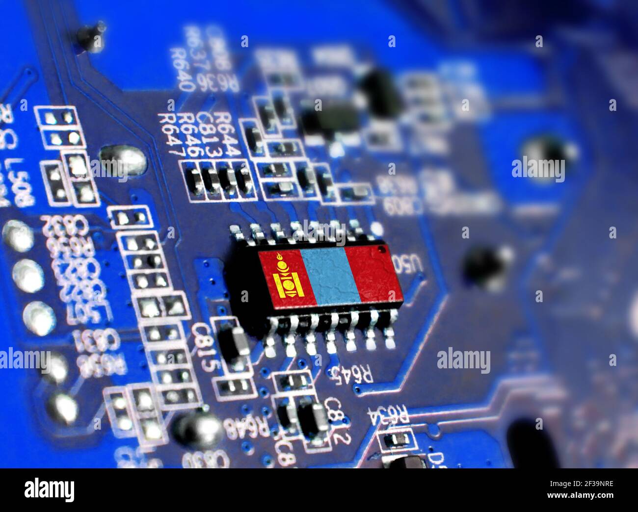 Electronic board with embedded microchip and shown flag of Mongolia ...