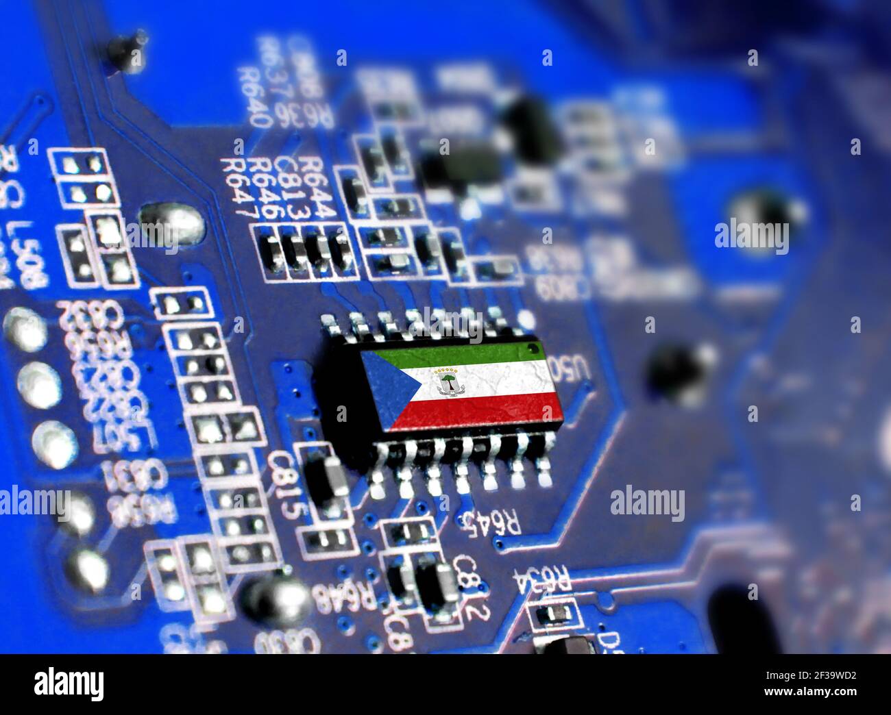 Electronic board with embedded microchip and shown flag of Equatorial ...