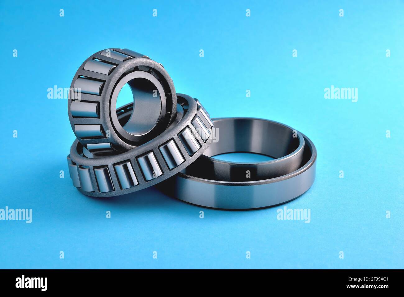 roller bearings on blue background, blank for creativity close-up ...