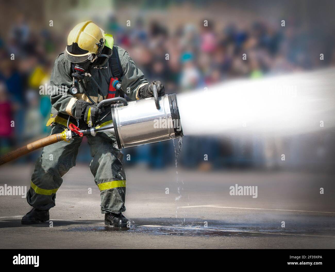 The Firefighters while extinguishing the fire with a special fire ...