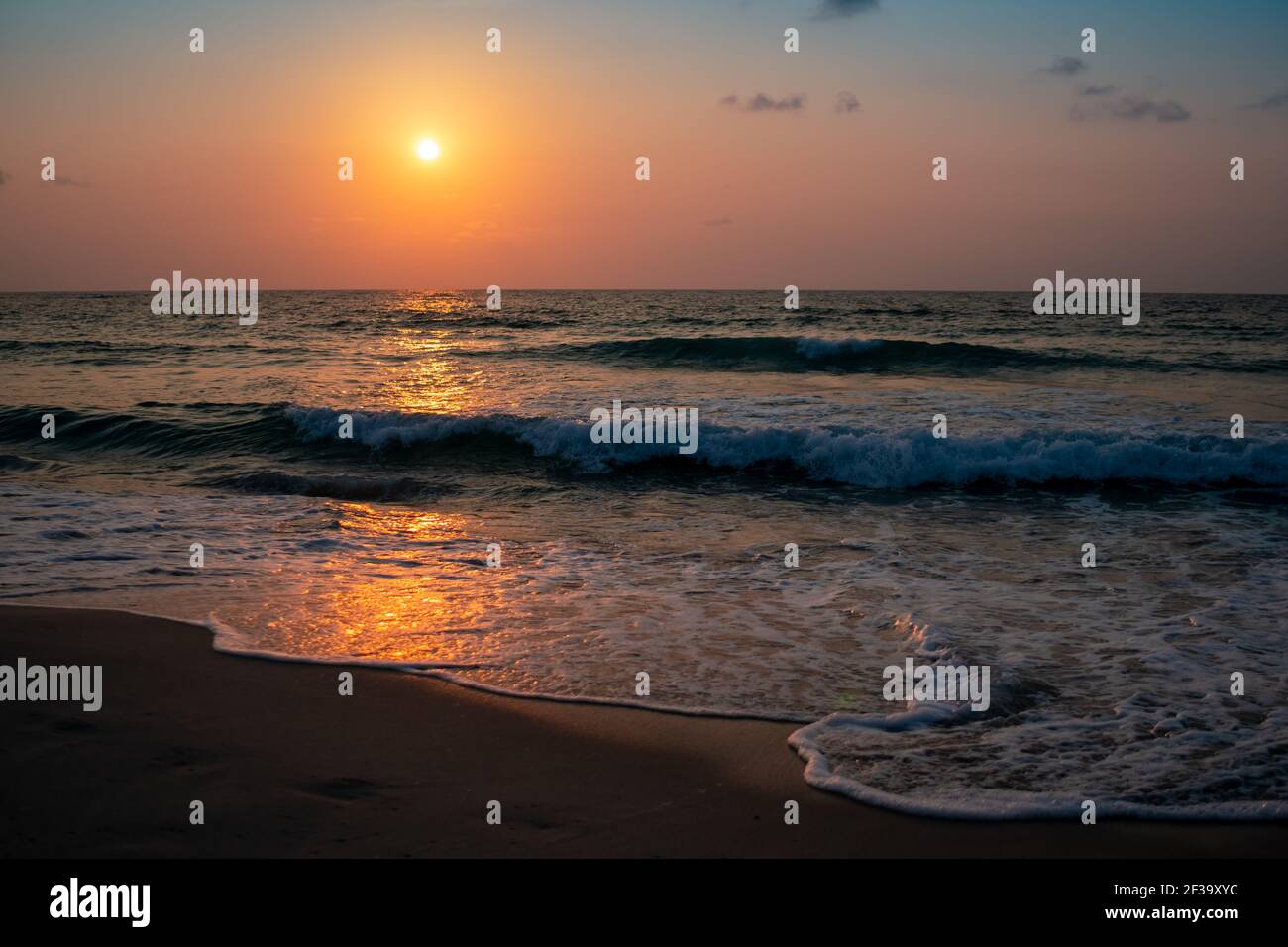 Colorful vibrant ocean sea wave beach summer with sunrise or sunset ...
