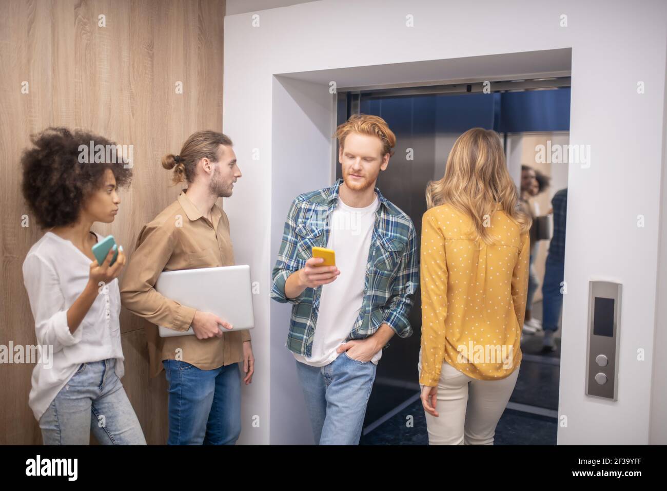 Elevator friends hi-res stock photography and images - Alamy