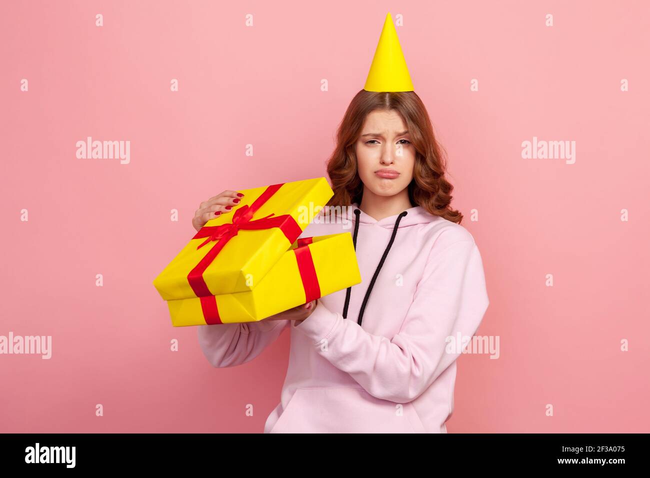 Disappointed girl birthday party hi-res stock photography and images ...