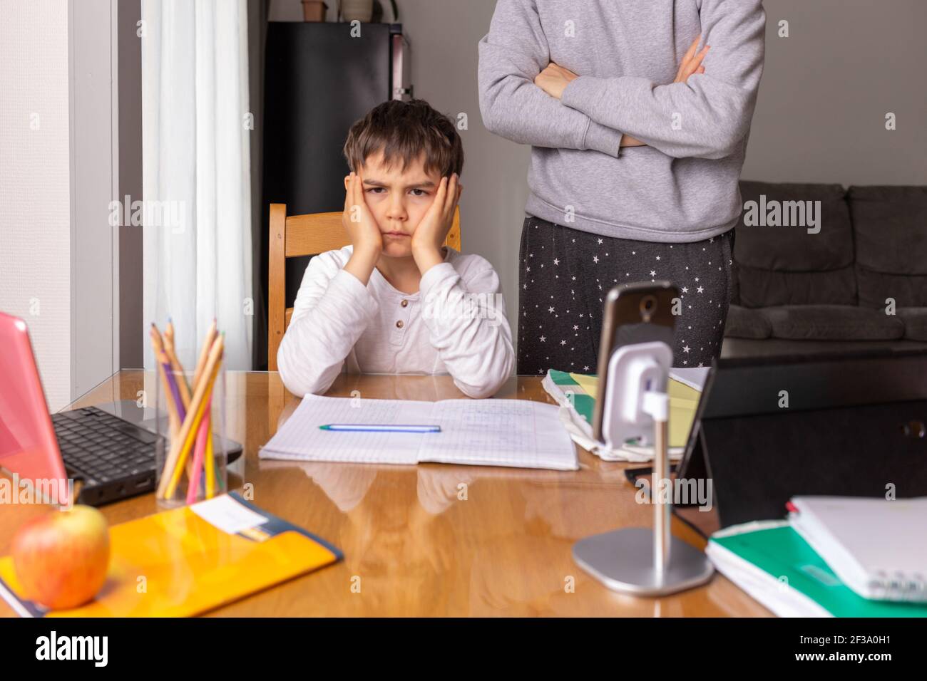 parents teaching kids at home, learning and studying remotely Stock ... parents teaching kids at home, learning and studying remotely Stock ...