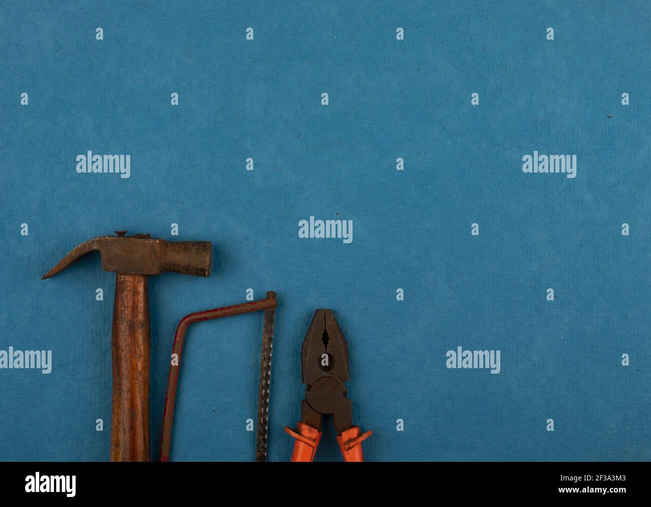 A set of working tools on a blue background Stock Photo - Alamy
