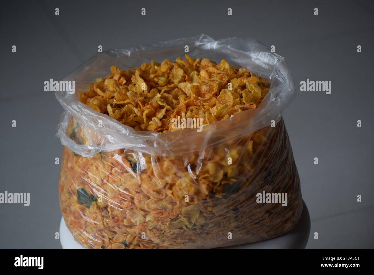 A bag of spicy corn flakes Stock Photo - Alamy
