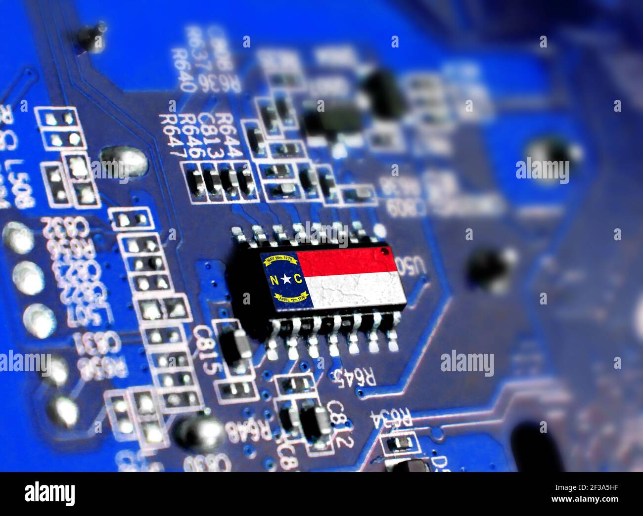 Electronic board with embedded microchip and shown flag State of North ...
