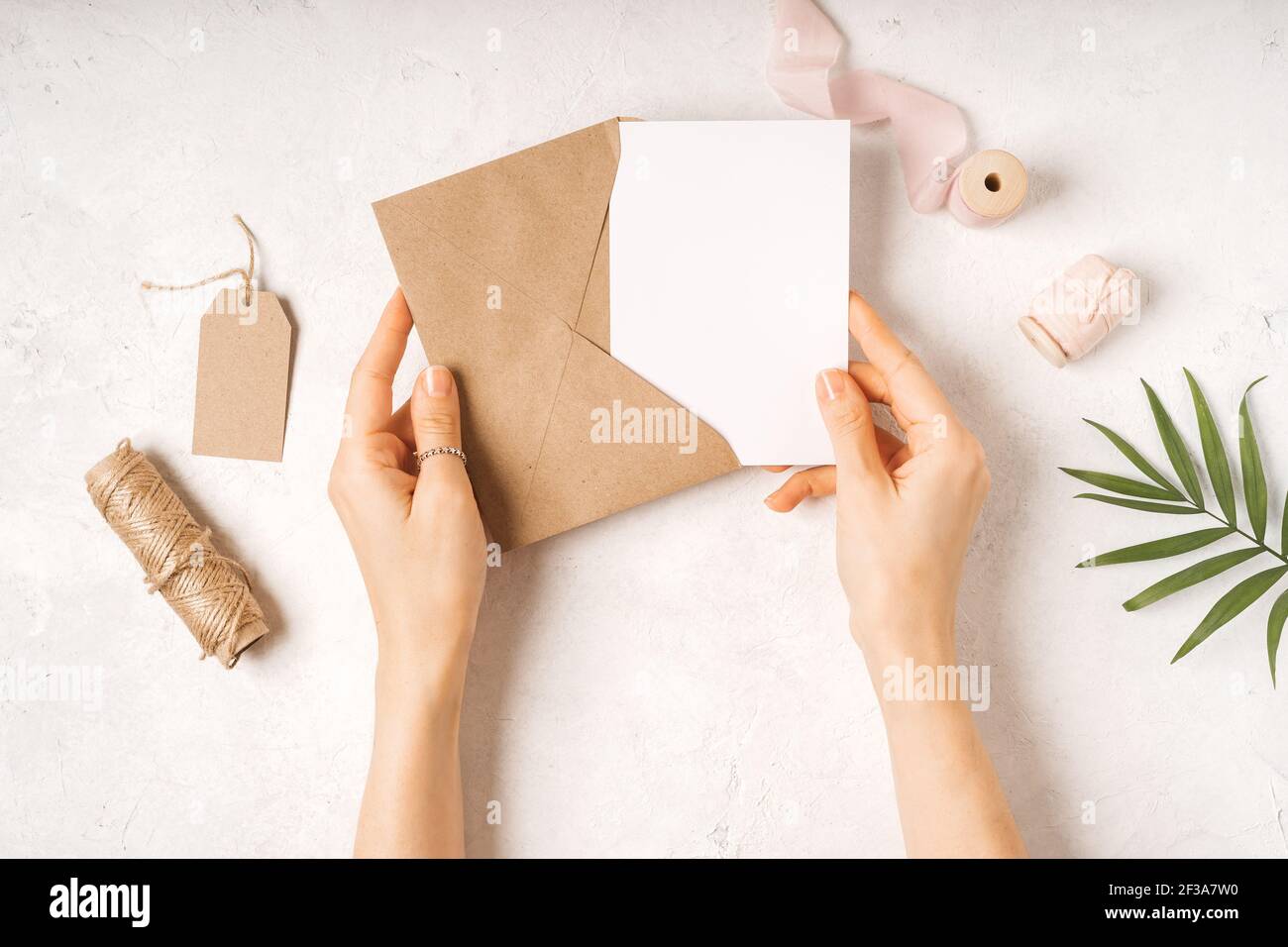 Envelope in hands hi-res stock photography and images - Alamy