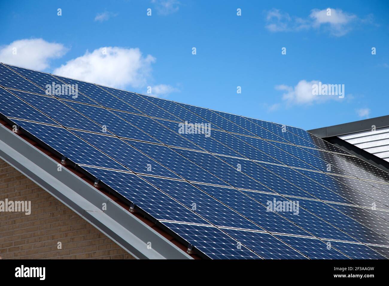 Solar cells on the roof of a residential building Stock Photo - Alamy