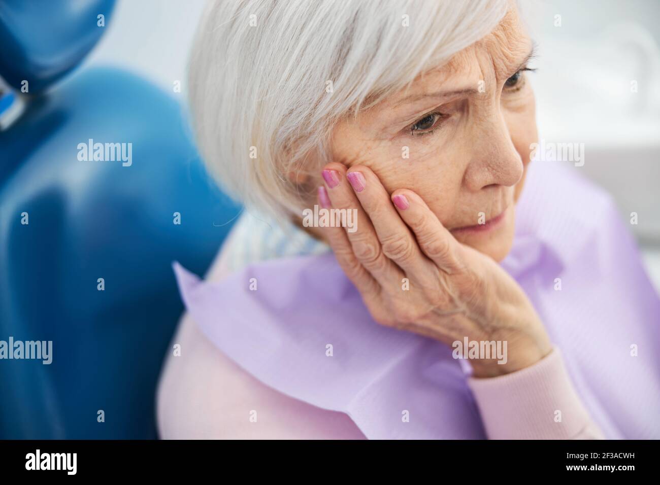 Grabbing elderly hi-res stock photography and images - Alamy