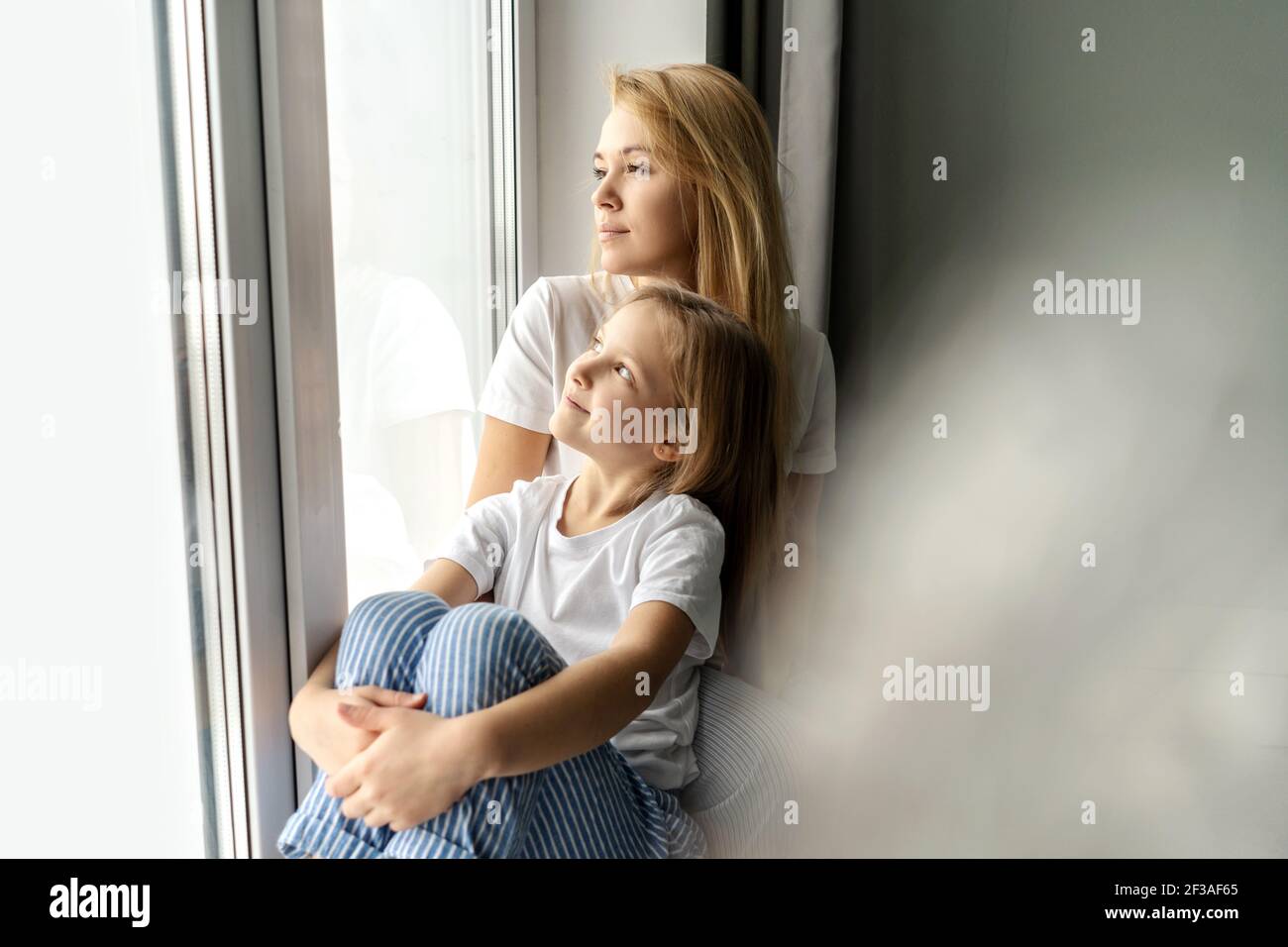 Mom With Little Girl Near Window Close up Portrait White T shorts Stock Photo Alamy mom-with-little-girl-near-window-close-up-portrait-white-t-shorts-stock-photo-alamy