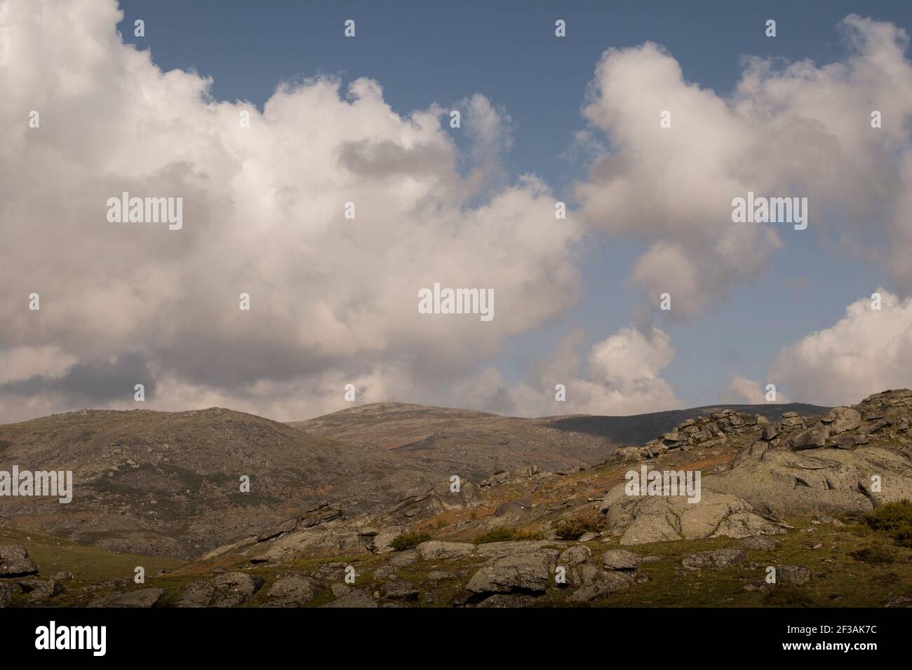 Mountain landscape of highland and meadows with contrast from shadows ...
