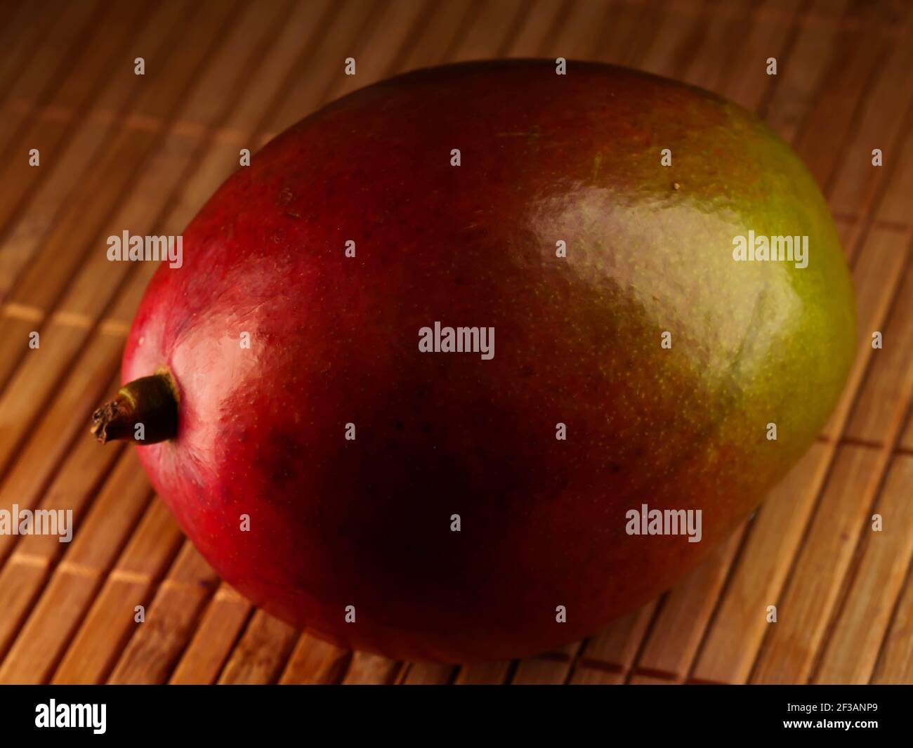Mango. On a white wooden background. Tropical Fruits. Top view. Free ...