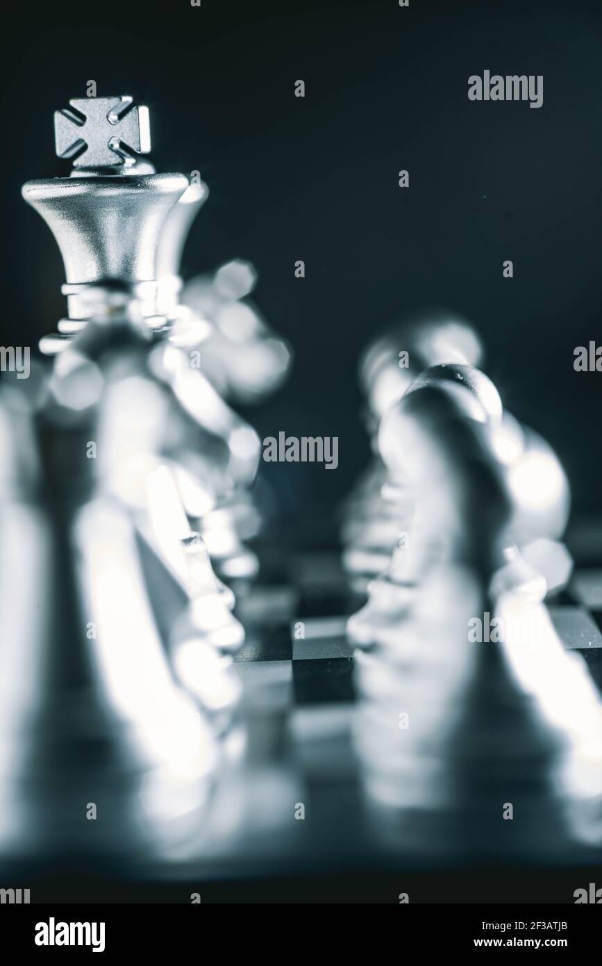business game competitive strategy with chess board game with blur ...