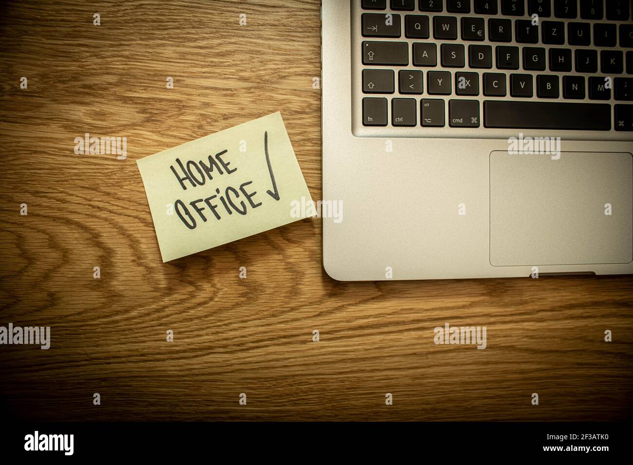 home office work note on wood table with laptop Stock Photo - Alamy