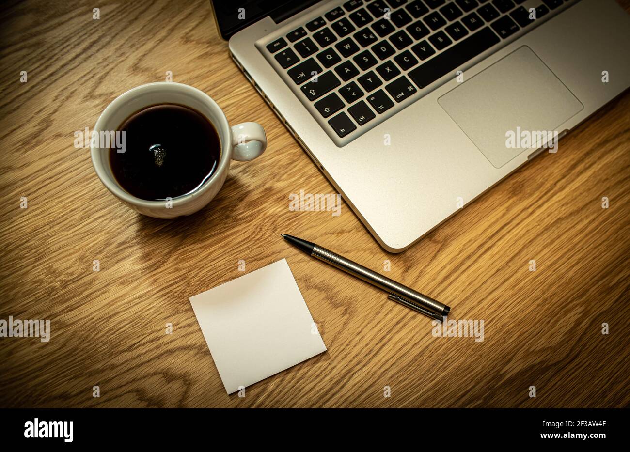 blank note in home office with man hand, pencil and computer Stock ...